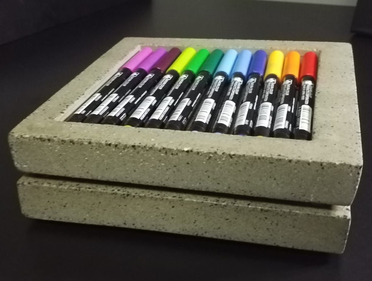 concrete store system for pens & markers | Domestika